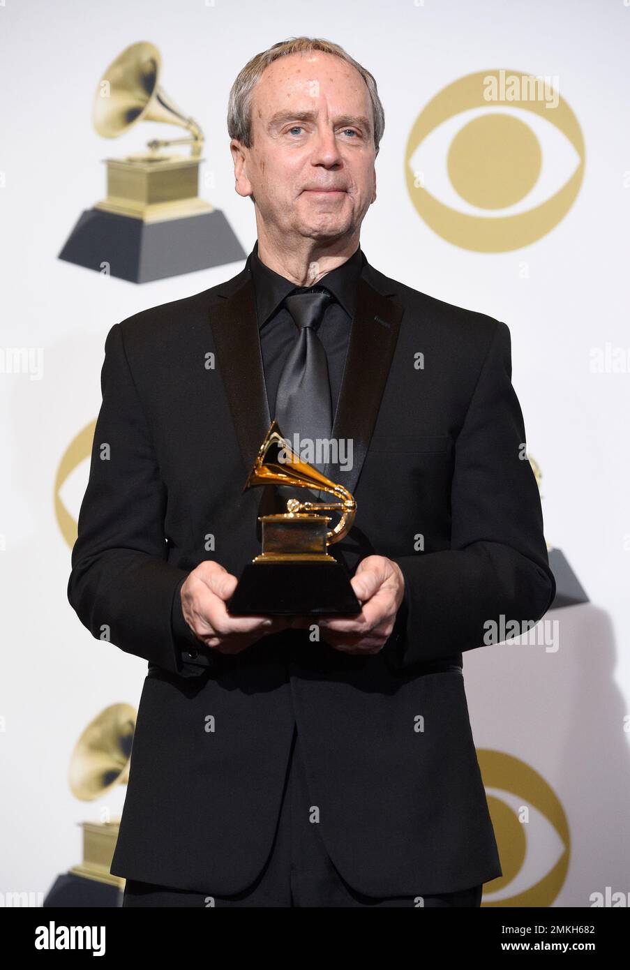 Tim Martyn poses in the press room with the award for best engineered ...