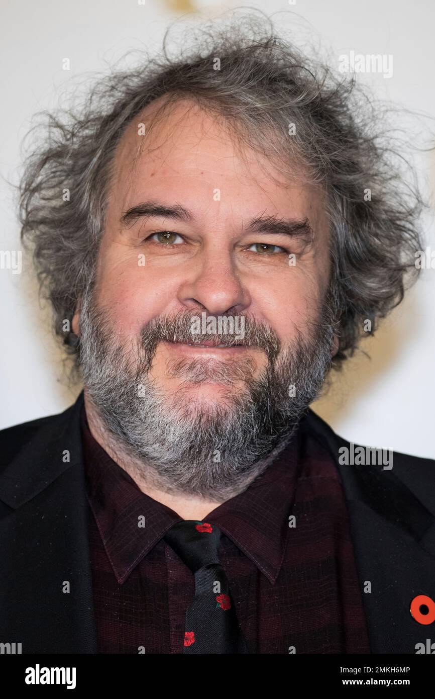 Director Peter Jackson poses for photographers upon arrival at the ...