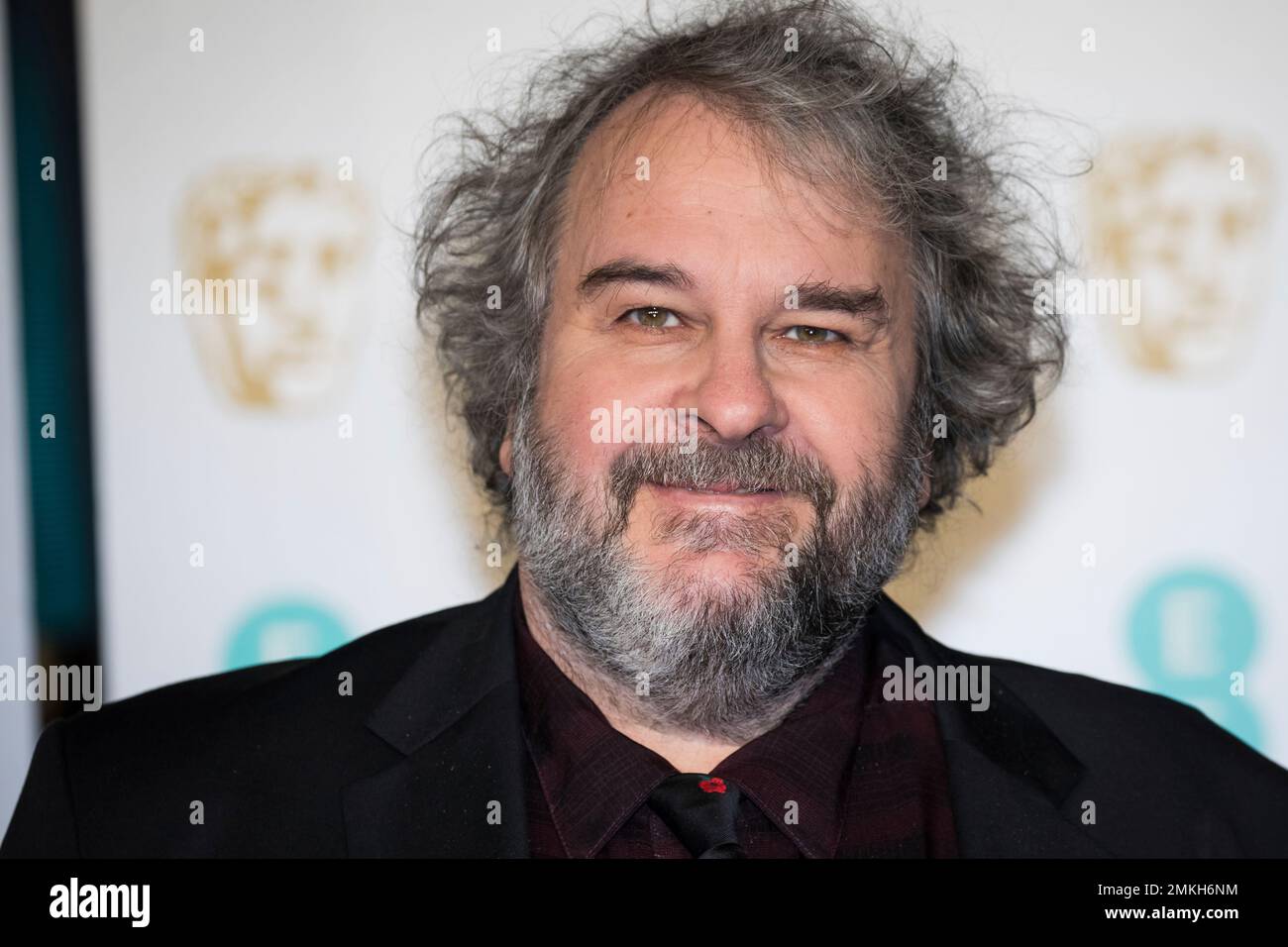 Director Peter Jackson poses for photographers upon arrival at the ...