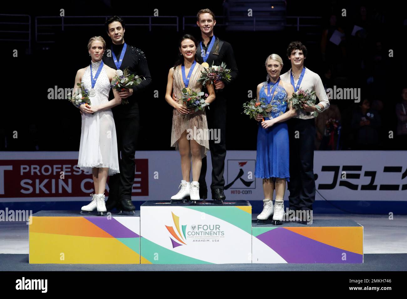 Ice dance competition winners from left, silver medalists, Kaitlyn Weaver and Andrew Poje, of ...