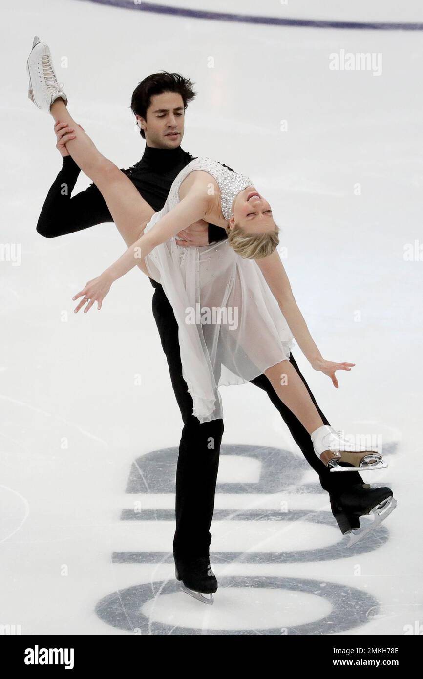 Kaitlyn Weaver and Andrew Poje, of Canada, perform during the ice dance ...