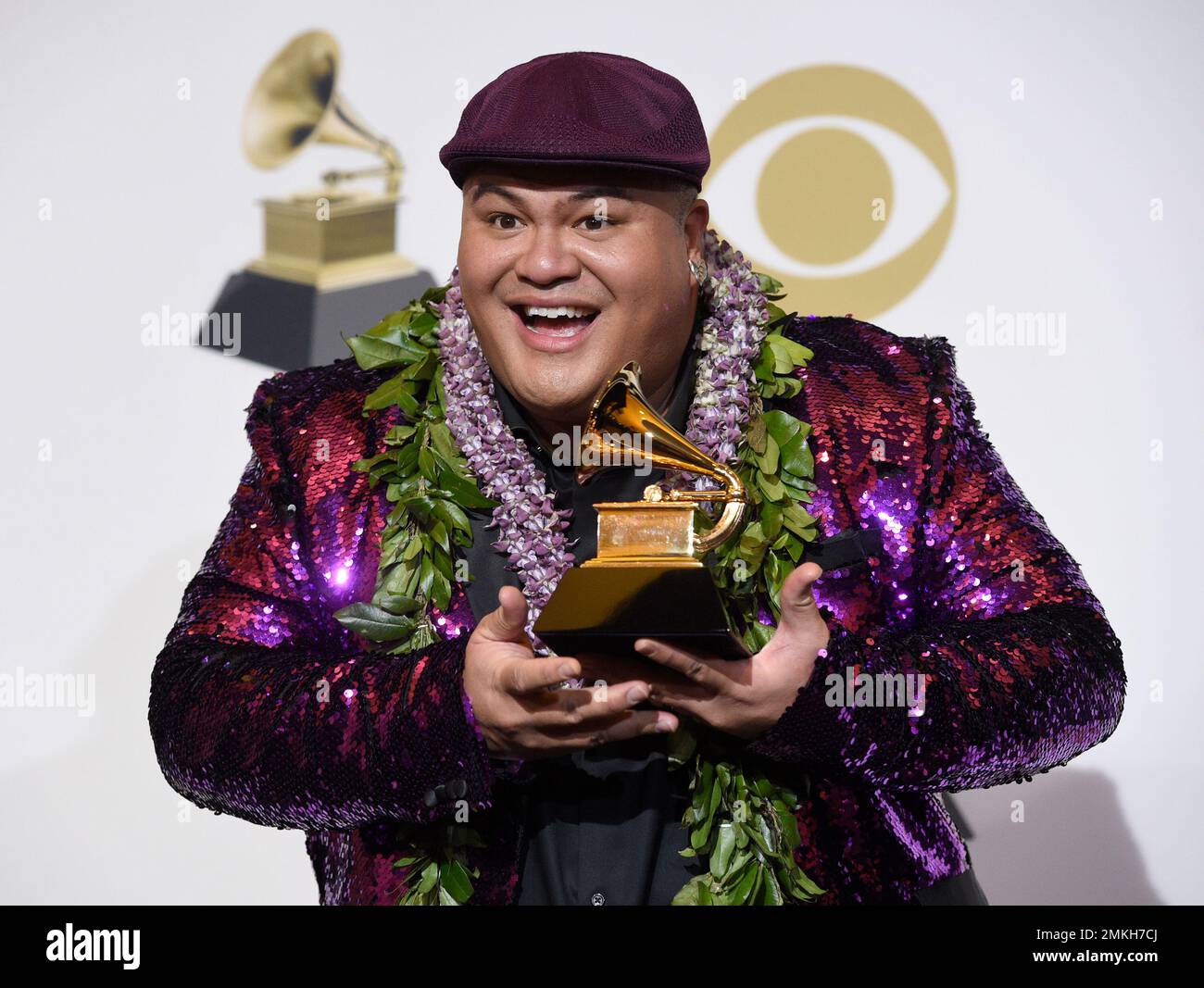 Kalani Pe'a poses in the press room with the award for best regional ...