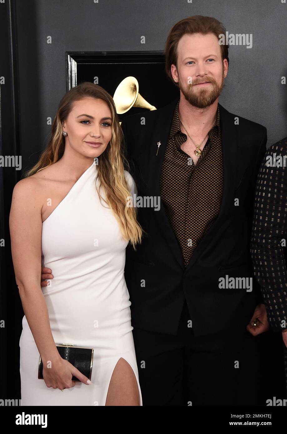 Brittney Marie Cole, left, Brian Kelley arrive at the 61st annual ...