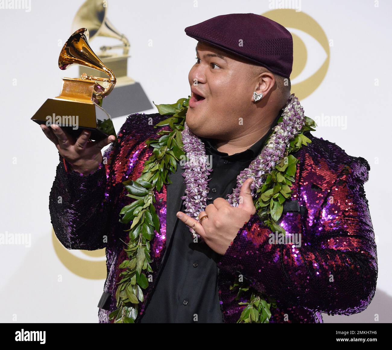 Kalani Pe'a poses in the press room with the award for best regional ...