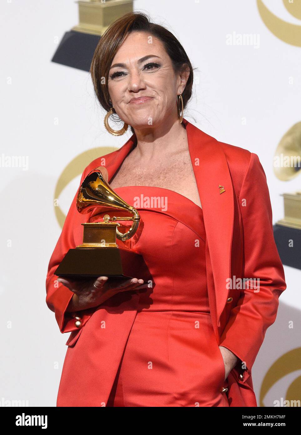 Claudia Brant poses in the press room with the award for best Latin pop ...