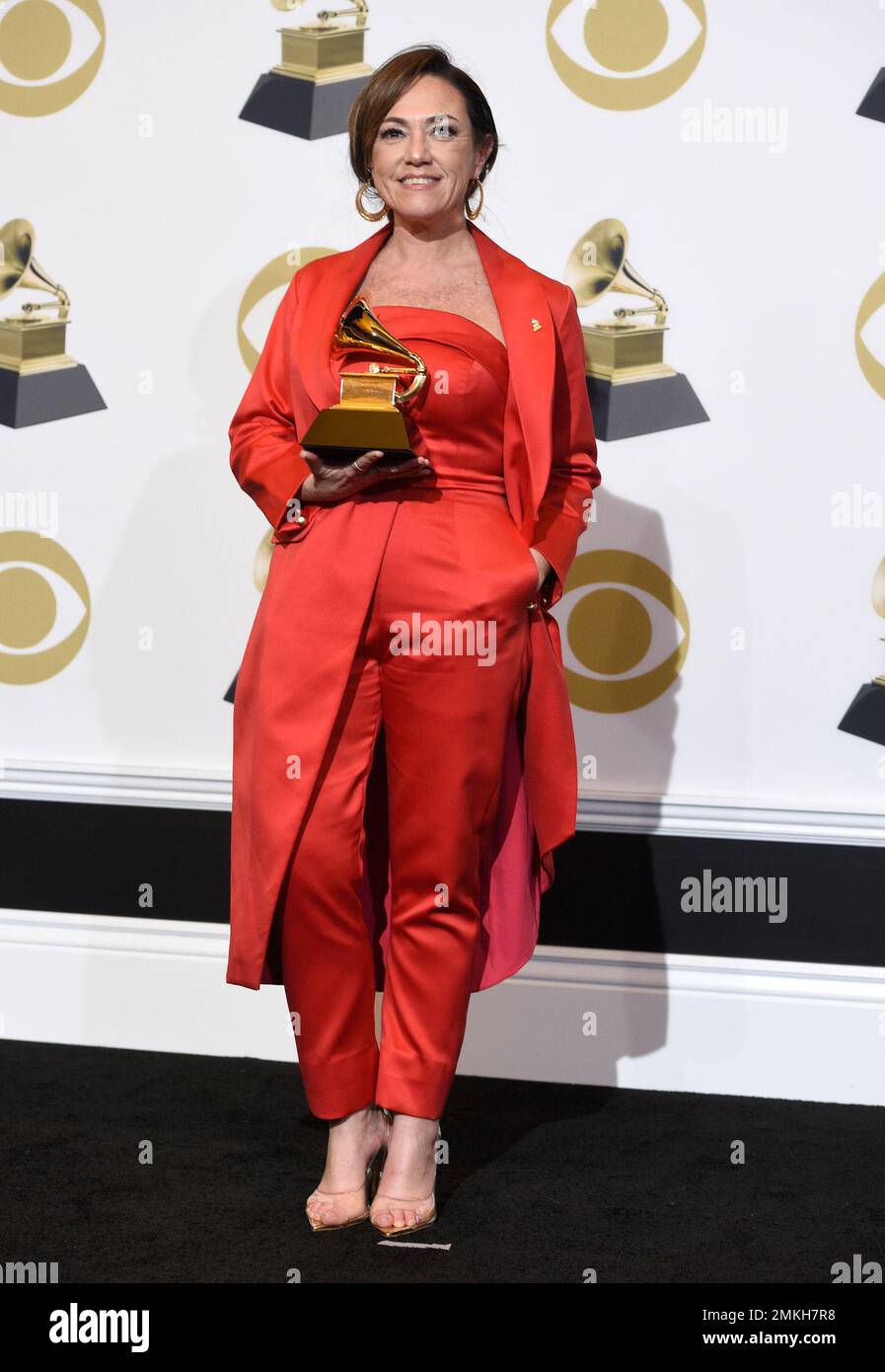 Claudia Brant poses in the press room with the award for best Latin pop ...