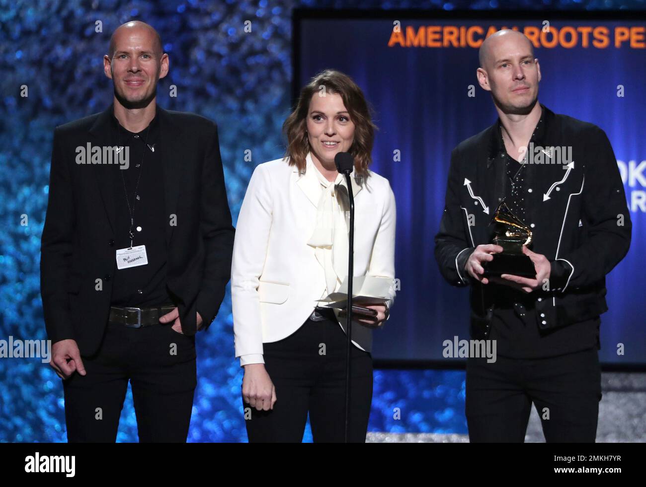 Phil Hanseroth, from left, Brandi Carlile and Tim Hanseroth accept the ...