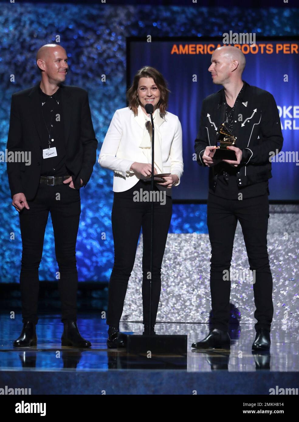Phil Hanseroth, from left, Brandi Carlile and Tim Hanseroth accept the ...