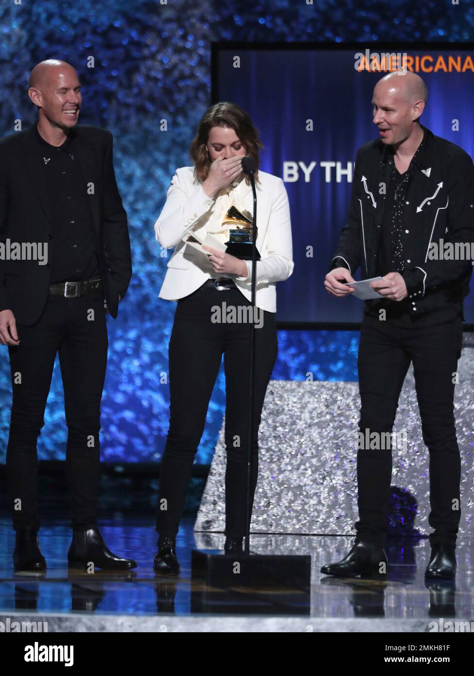 Phil Hanseroth, from left, Brandi Carlile and Tim Hanseroth accept the ...