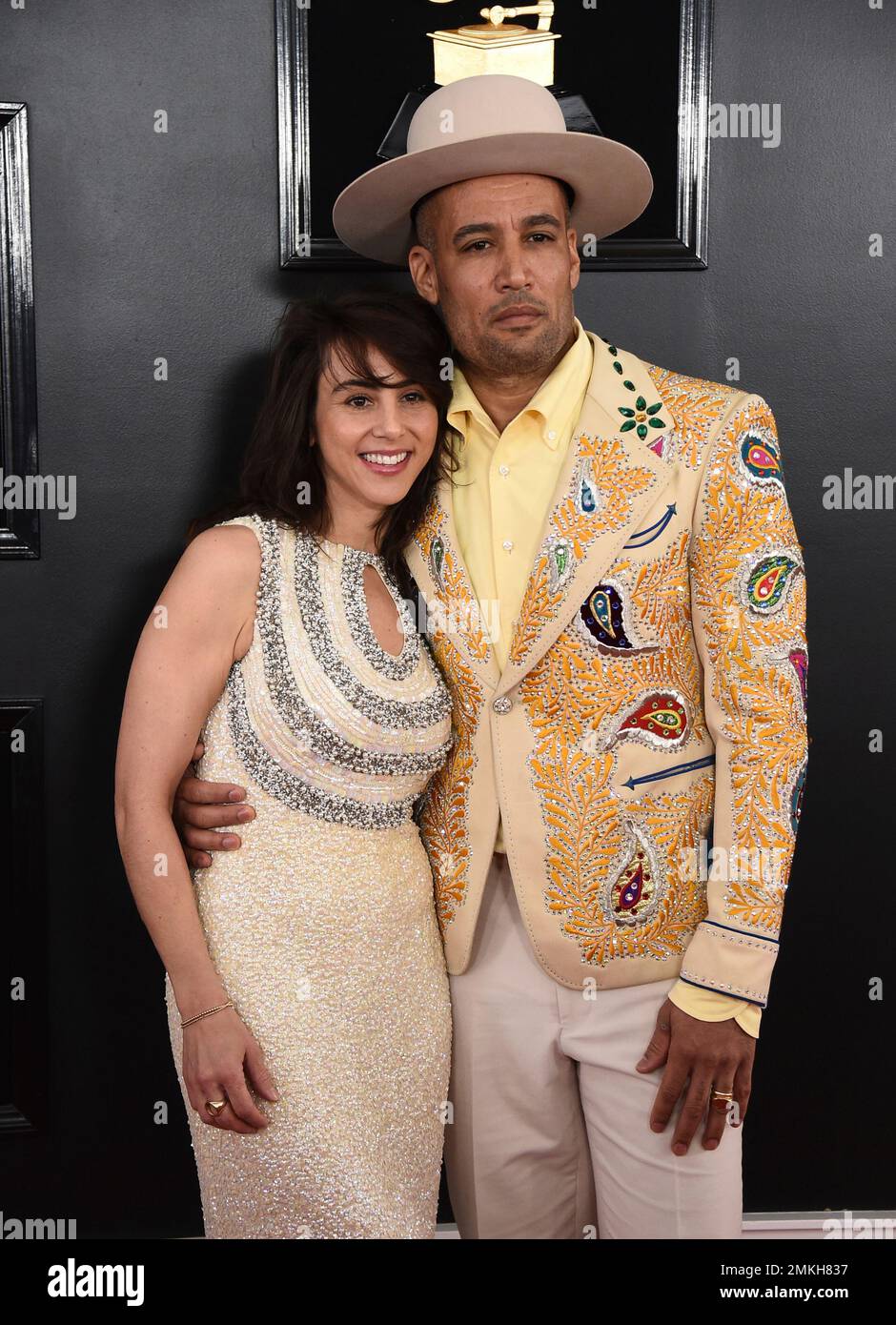 Jaclyn Matfus, left, and Ben Harper arrive at the 61st annual Grammy ...