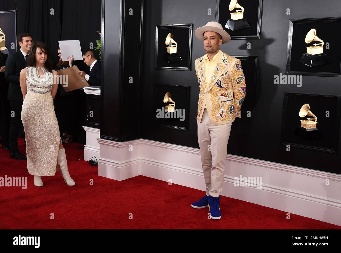 Jaclyn Matfus, left, and Ben Harper arrive at the 61st annual Grammy ...