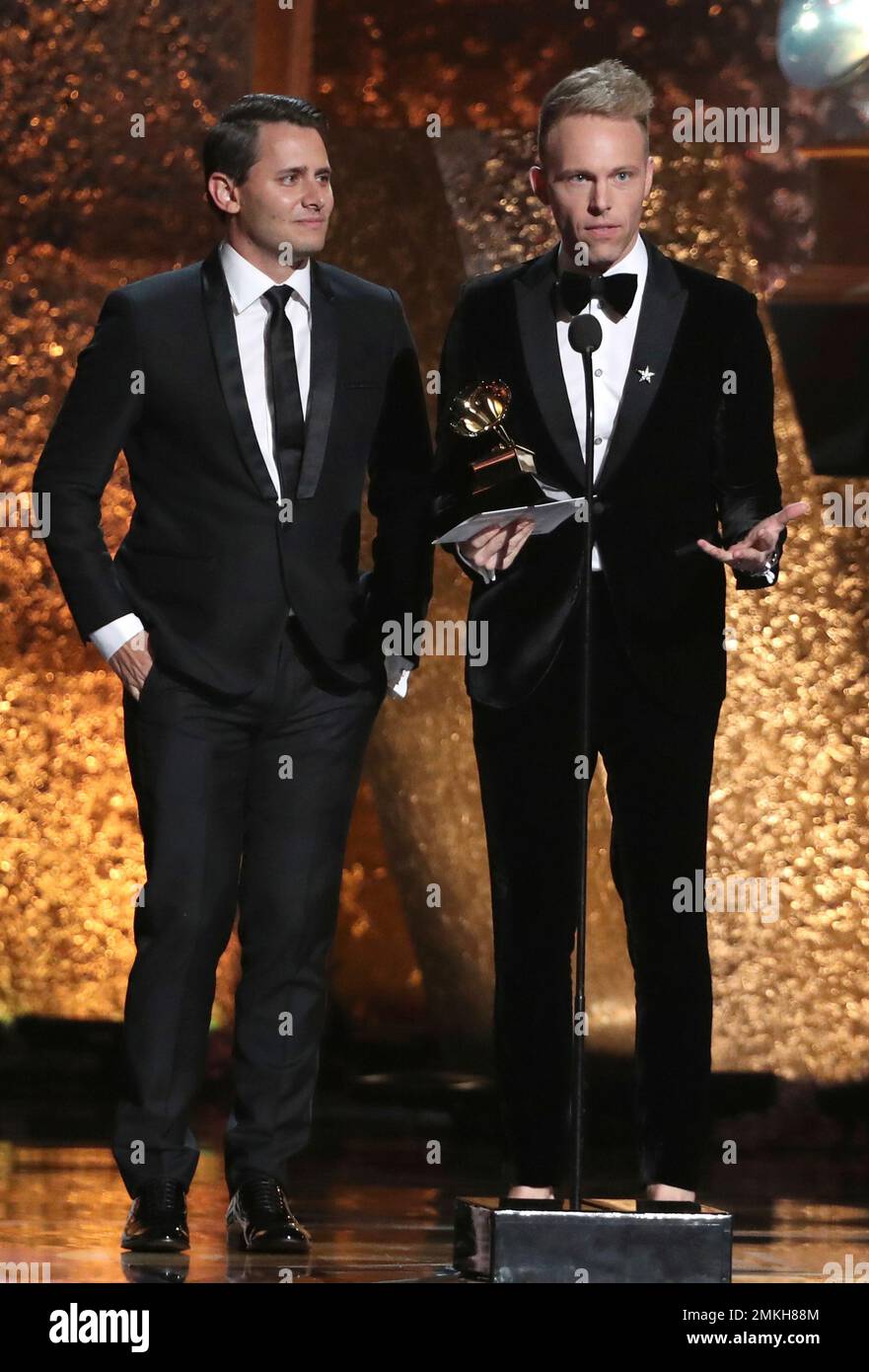 Benj Pasek, left, and Justin Paul accept the award for compilation ...