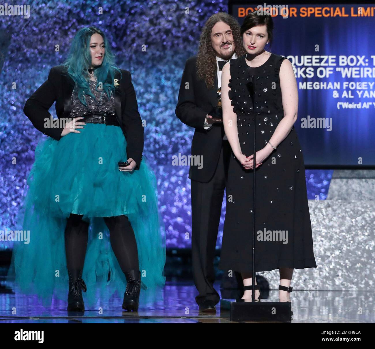 Annie Stoll, from left, "Weird Al" Yankovic and Meghan Foley accept the ...