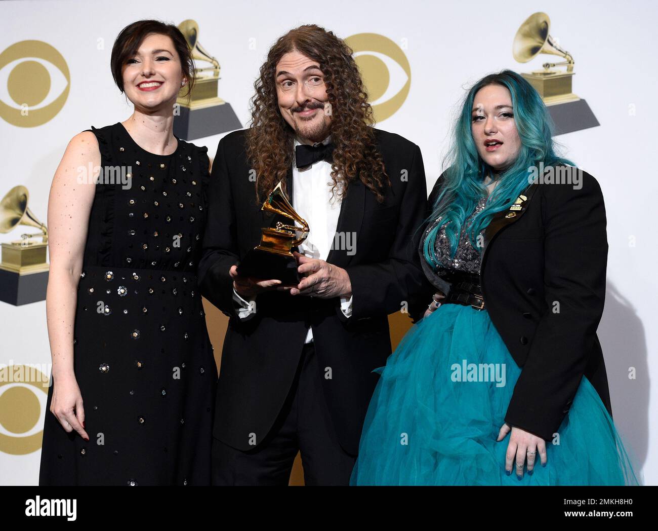 Meghan Foley, from left, "Weird Al" Yankovic and Annie Stoll pose in ...