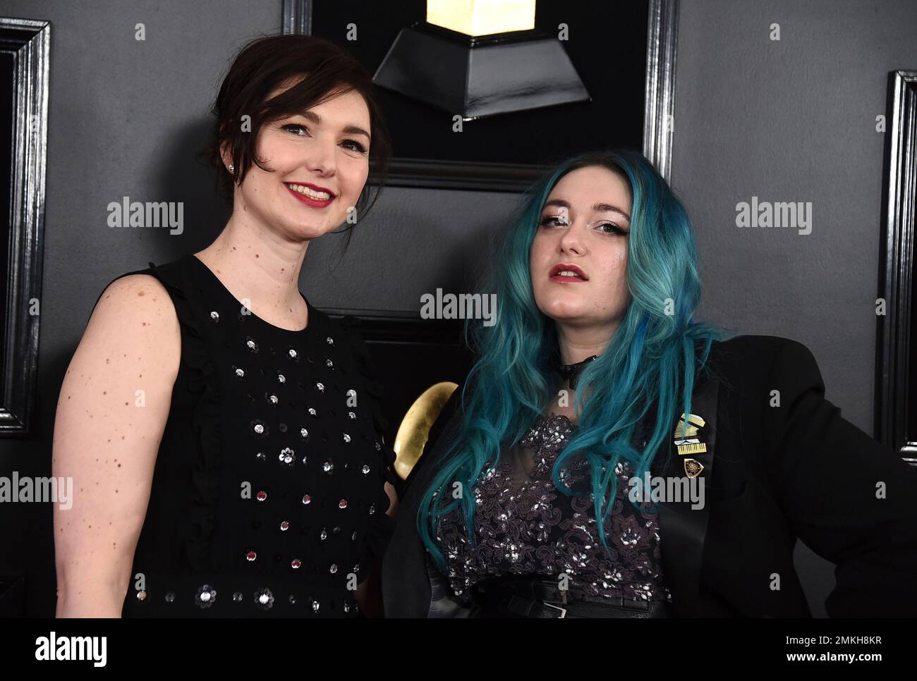 Meghan Foley, left, and Annie Stoll arrive at the 61st annual Grammy ...