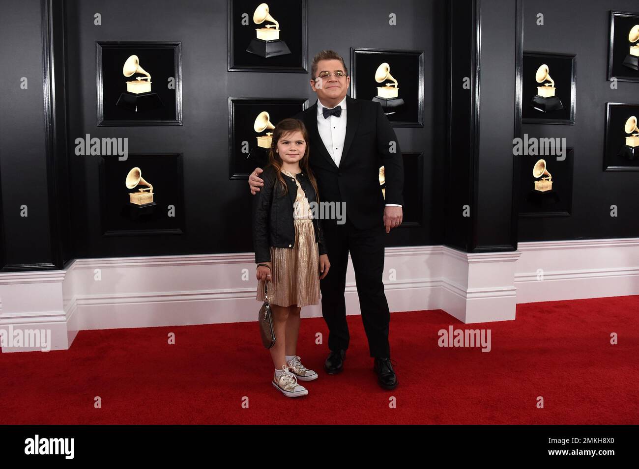 Patton Oswalt, right, and his daughter Alice Oswalt arrive at the 61st ...
