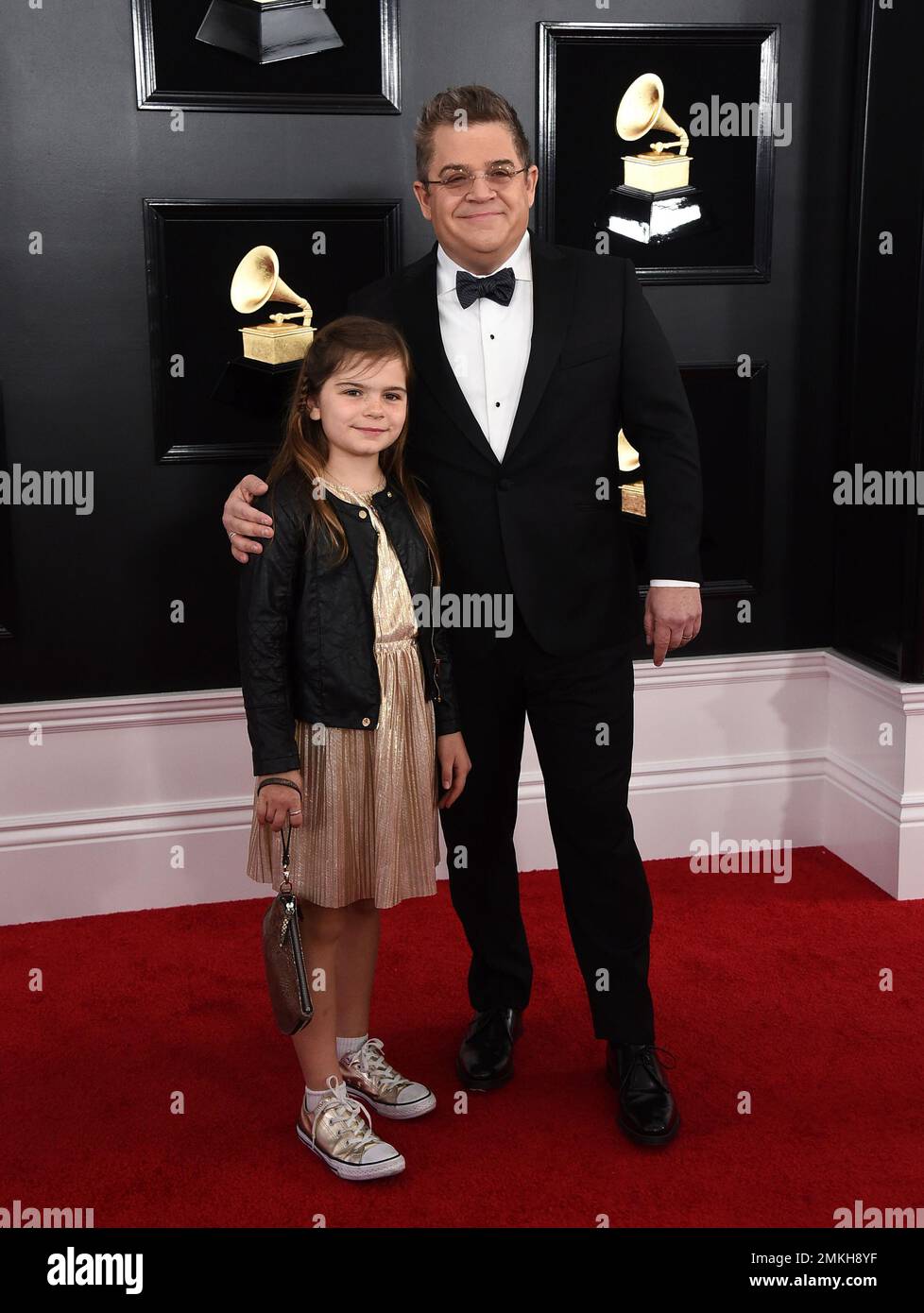 Patton Oswalt, right, and his daughter Alice Oswalt arrive at the 61st ...