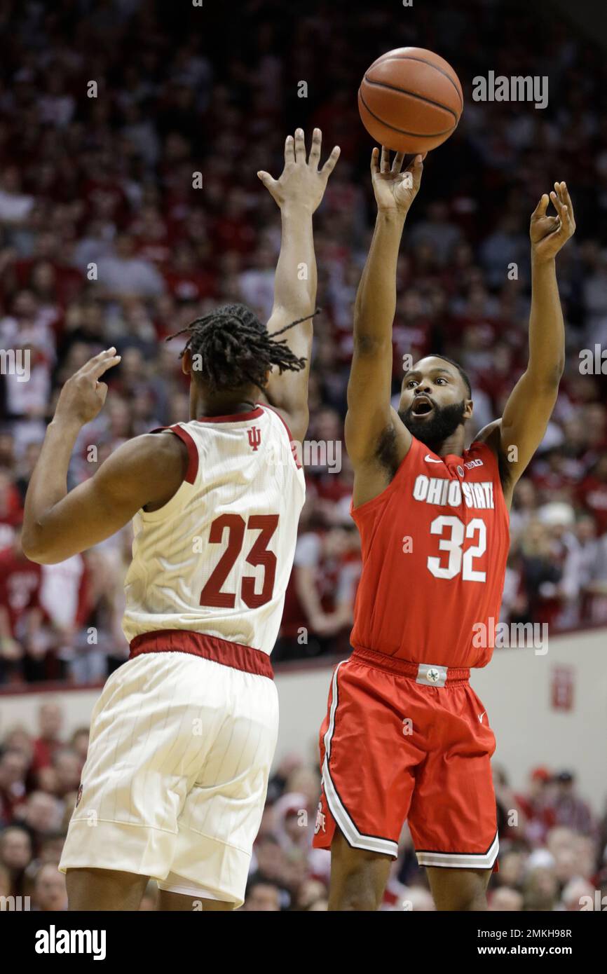 Ohio State's Keyshawn Woods (32) shoots over Indiana's Damezi Anderson ...
