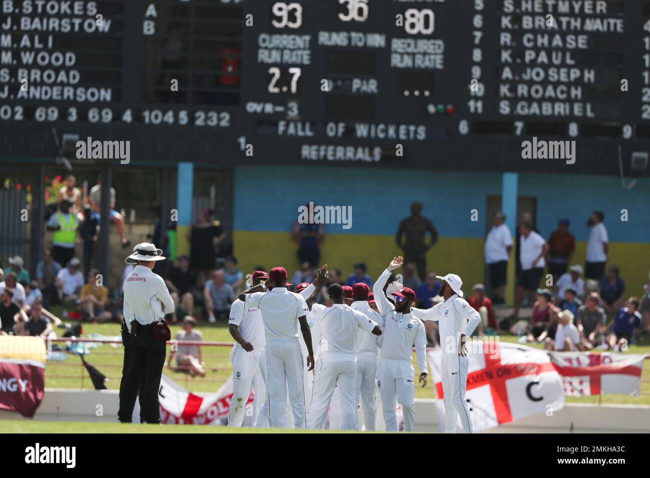 Players of West Indies celebrate the dismissal of England's Ben Stokes ...