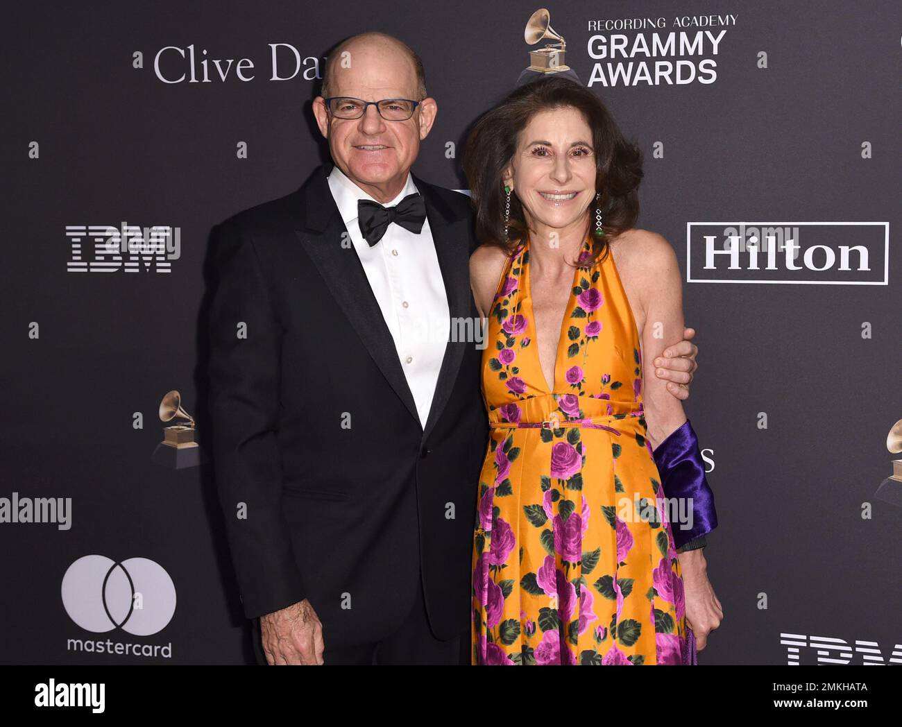 Scott Greenstein, left, and guest arrive at the Pre-Grammy Gala And ...