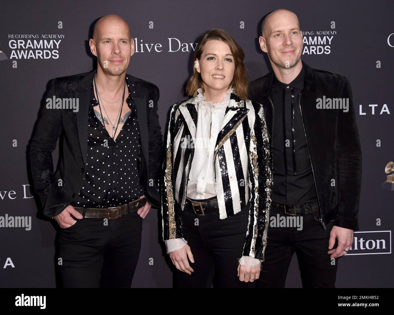 Phil Hanseroth, from left, Brandi Carlile, and Tim Hanseroth arrive at ...