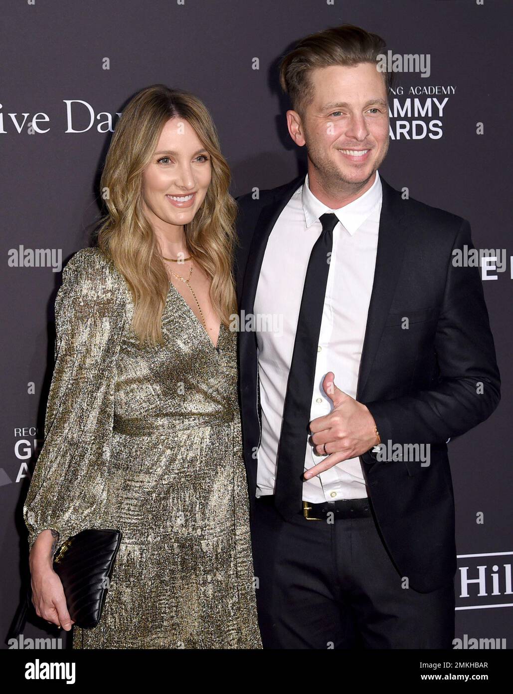 Genevieve Tedder, left, and Ryan Tedder arrive at the Pre-Grammy Gala ...