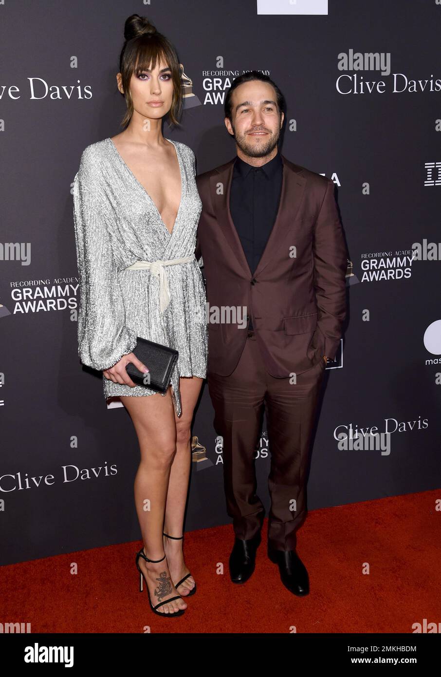 Pete Wentz, right, and Meagan Camper arrive at the Pre-Grammy Gala And ...