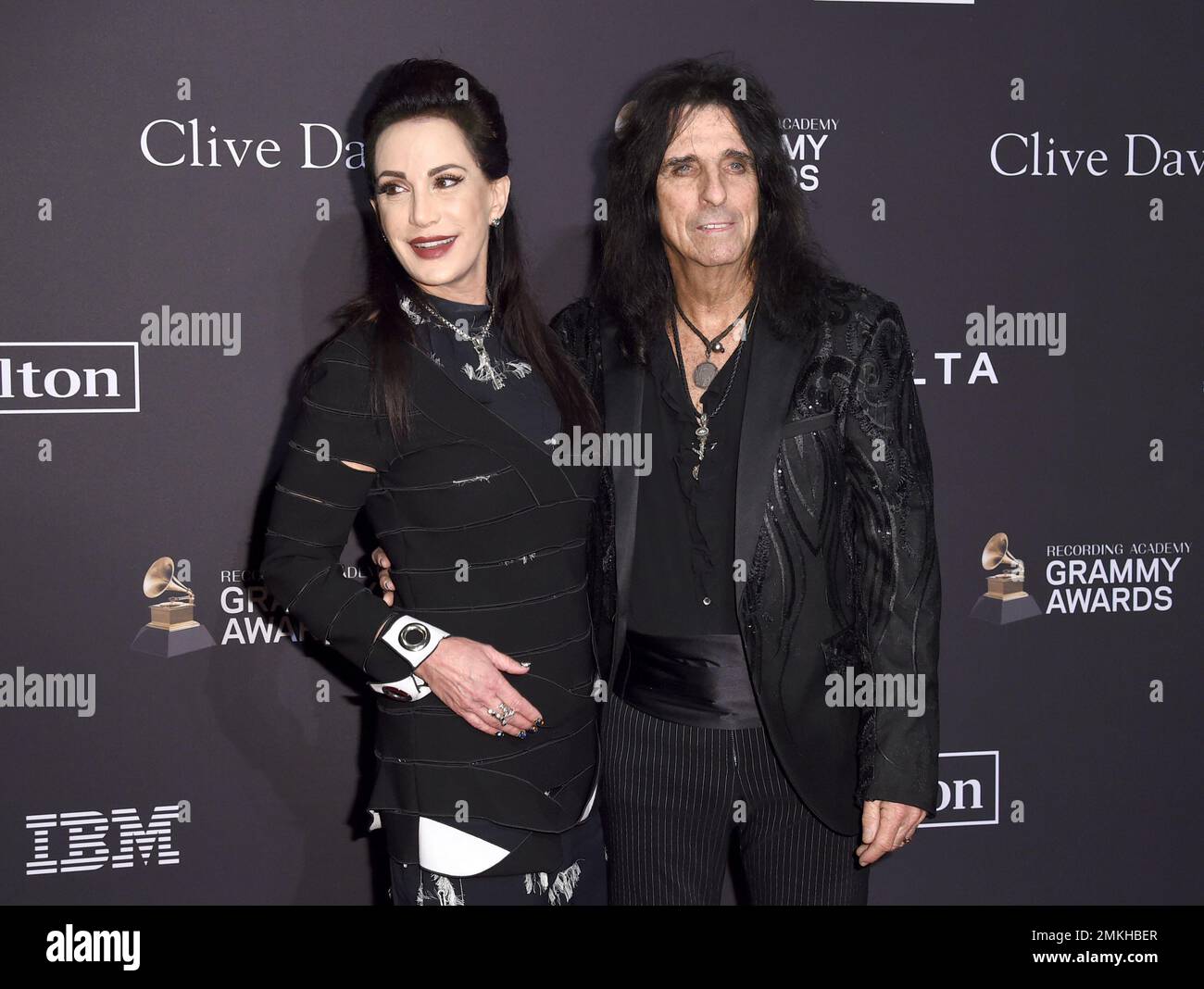 Alice Cooper, right, and Sheryl Goddard arrive at the Pre-Grammy Gala ...