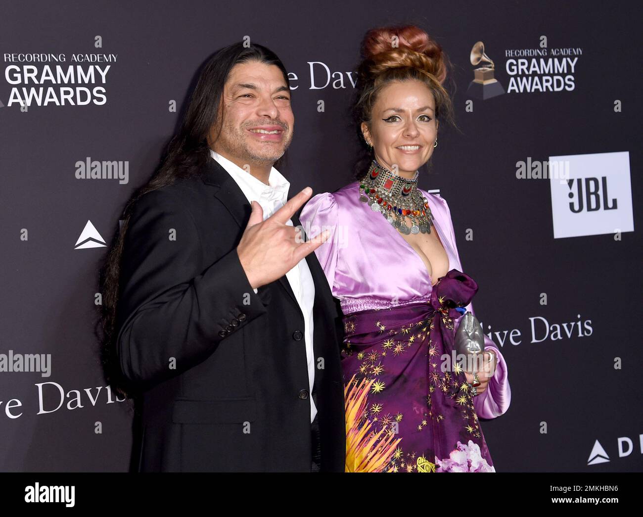 Robert Trujillo, left, and Chloe Trujillo arrive at Pre-Grammy Gala And ...