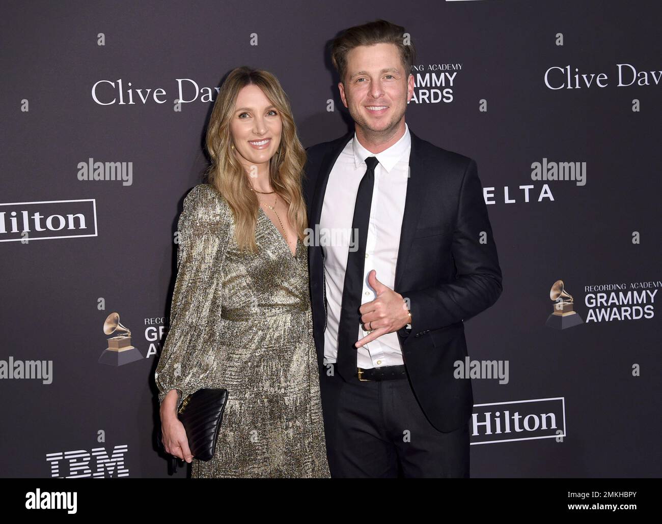 Genevieve Tedder, left, and Ryan Tedder arrive at the Pre-Grammy Gala ...
