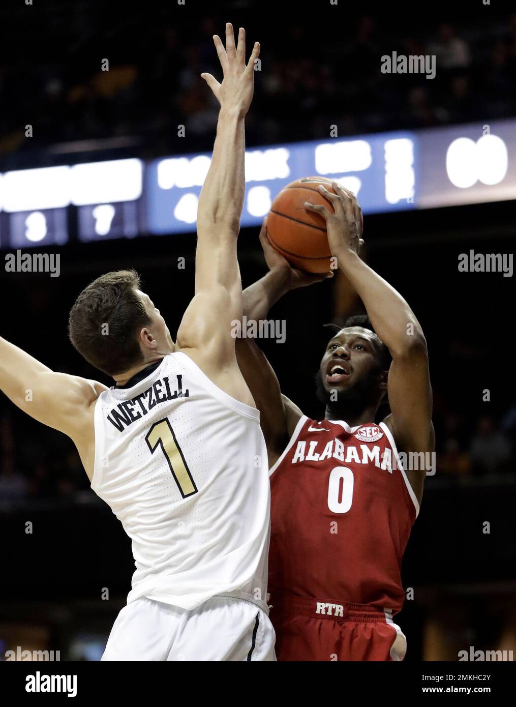Alabama forward Donta Hall (0) shoots against Vanderbilt forward Yanni ...