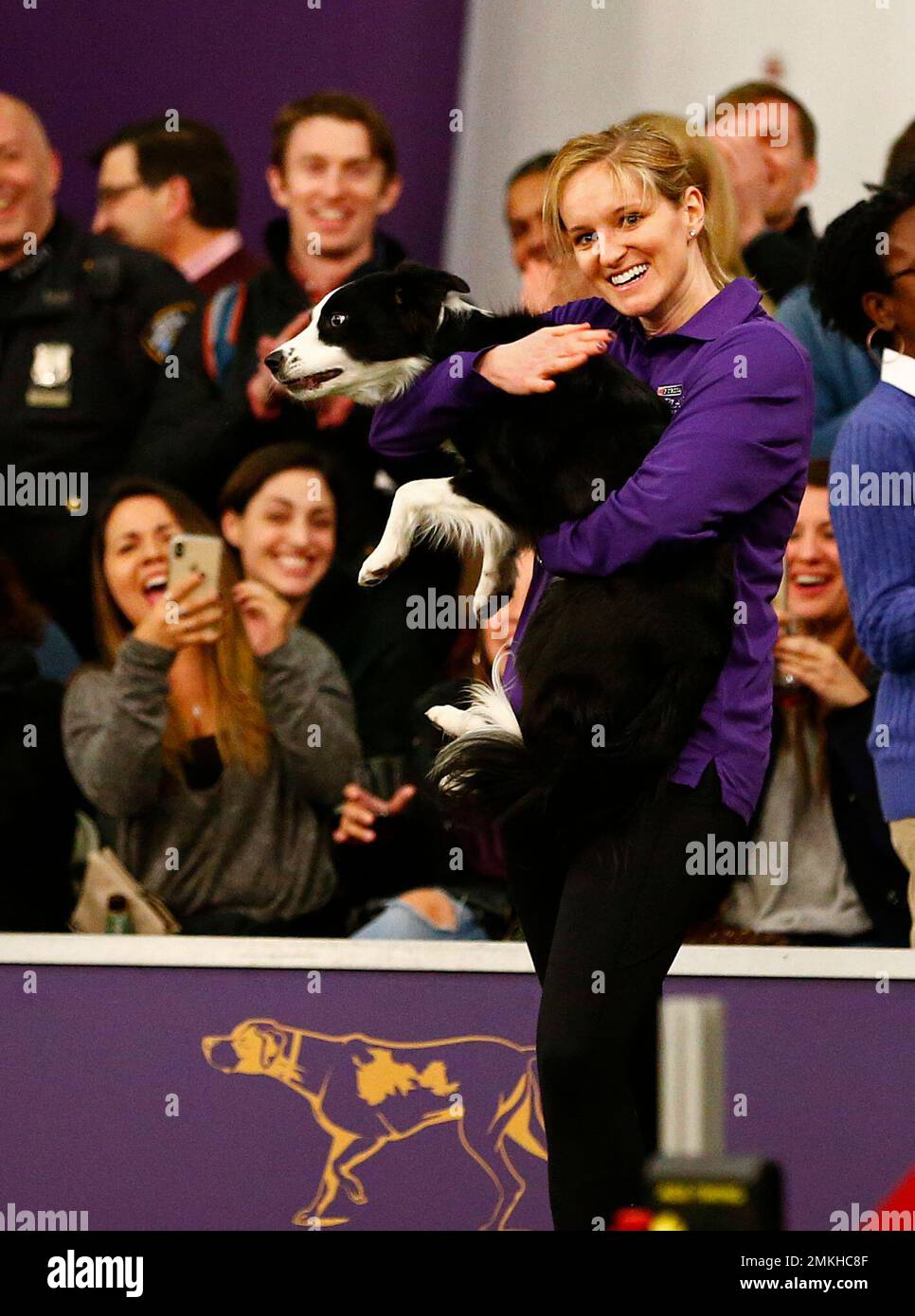 Handler Jennifer Crank and her border collie "Pink" celebrate during ...