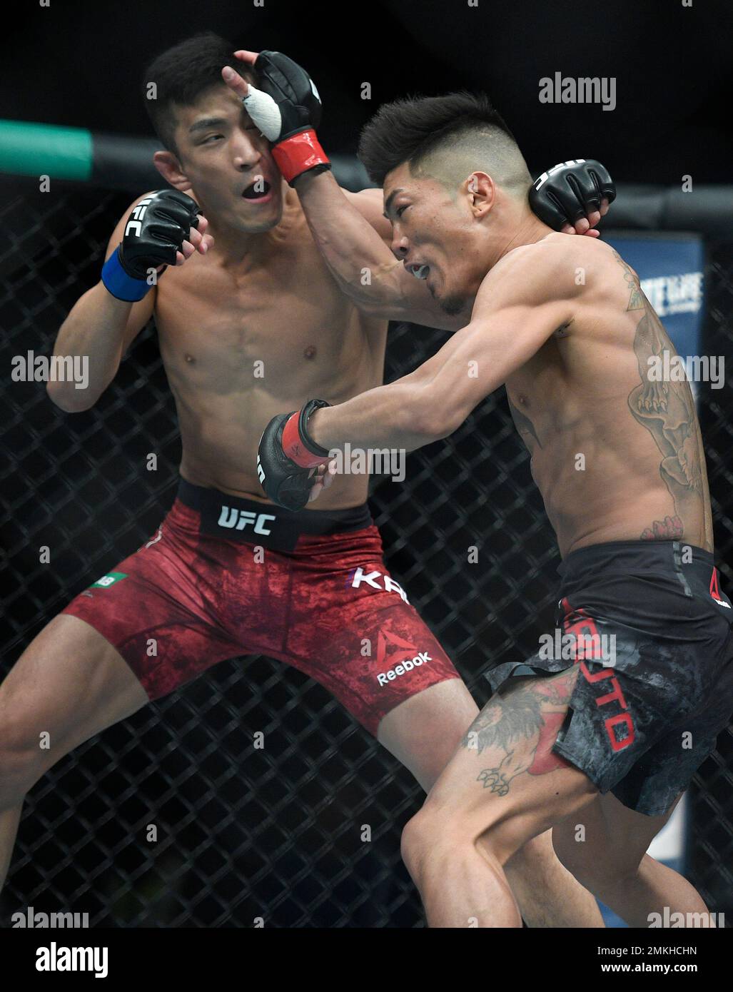 Teruto Ishihara, right, of Japan, and Kyung Ho Kang, left, of South ...