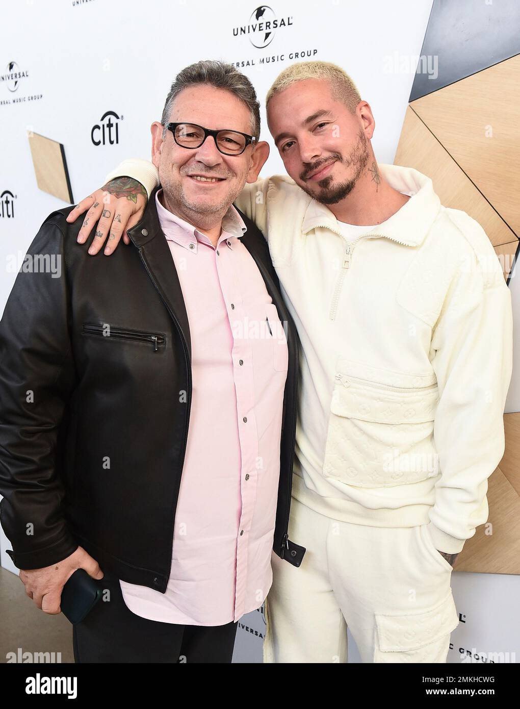 Sir Lucian Grainge, Chairman & CEO of Universal Music Group, left, and ...