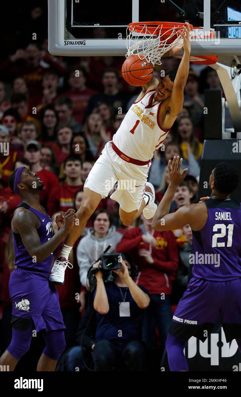 Iowa State guard Nick Weiler-Babb, center, dunks the ball over TCU ...