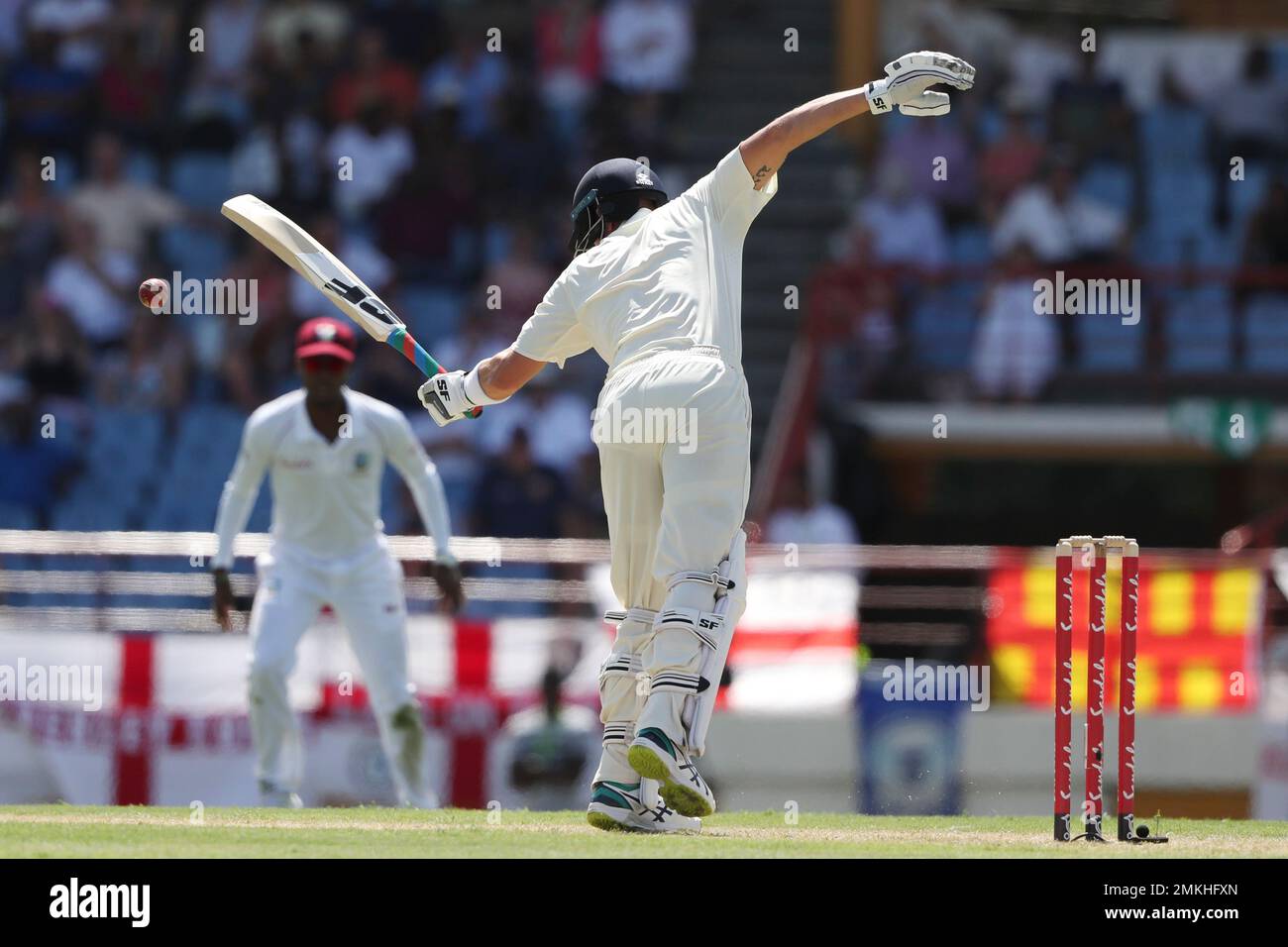 England's Joe Denly plays a shot against West Indies during day one of ...