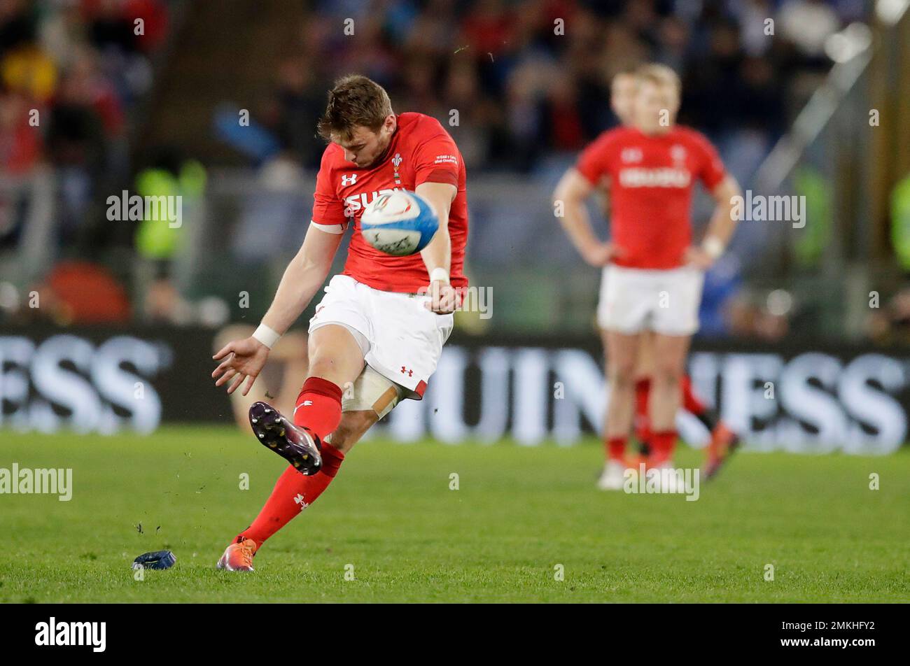 Wales' Jonah Holmes kicks the ball as he scores during the Six Nations ...