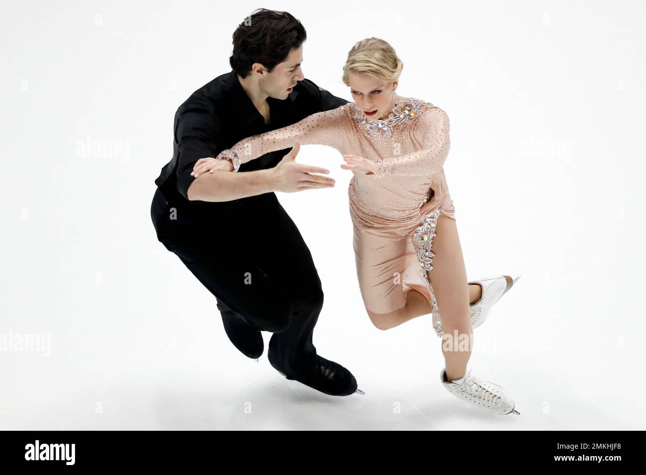 Kaitlyn Weaver and Andrew Poje, of Canada, perform during the ice dance ...