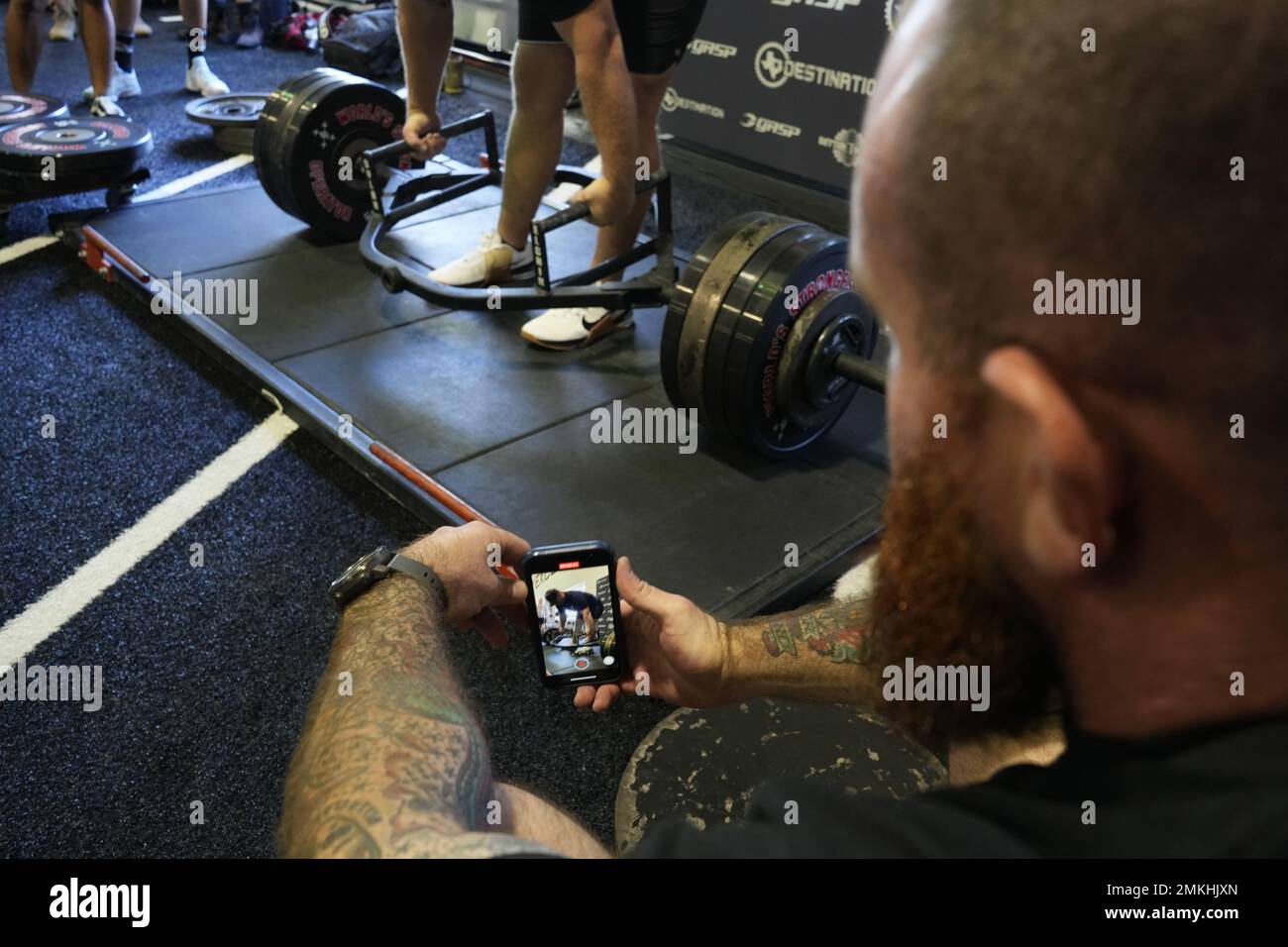 Jordan Betz, 26th Special Tactics Squadron strength and conditioning coach, films the deadlift ...