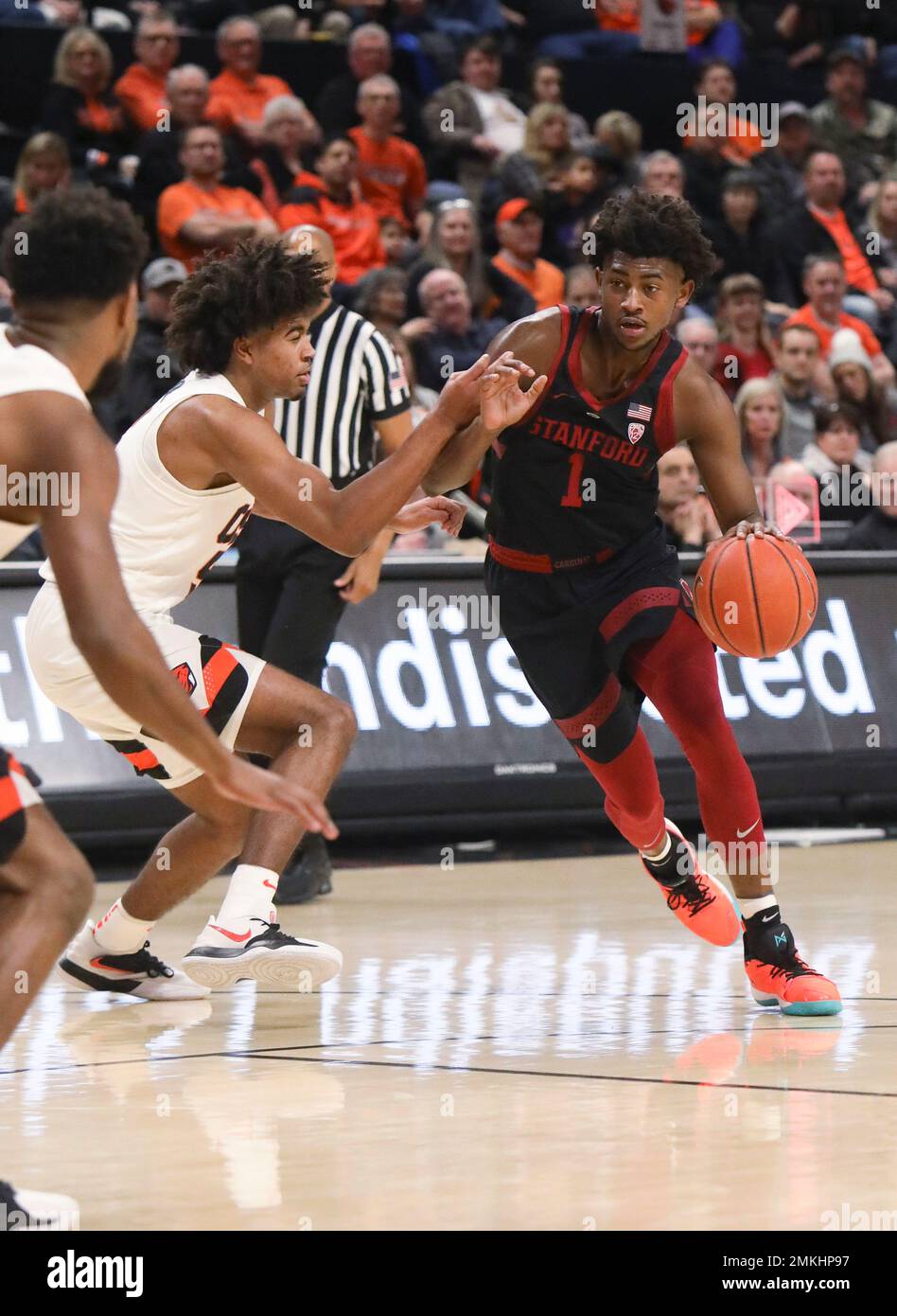 Stanford's Daejon Davis, right, tries to avoid Oregon State's Ethan ...