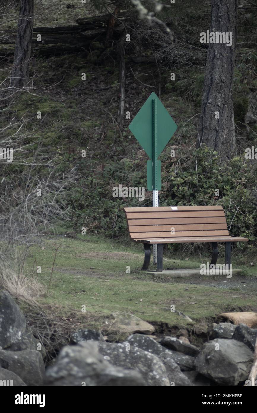 Lonely road sign who wants to blend in Stock Photo - Alamy