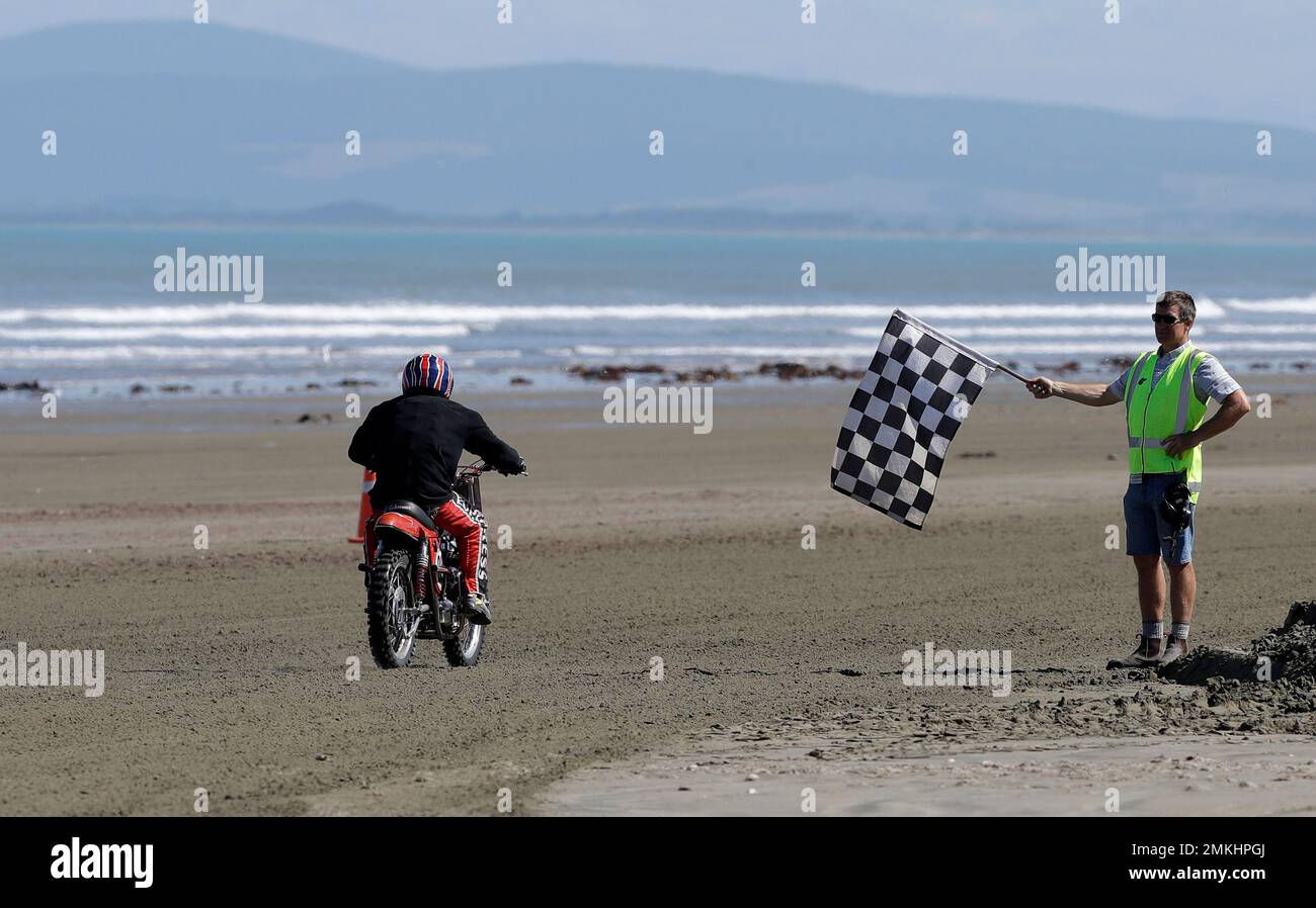 A rider crosses the finish line during an event at the New Zealand ...