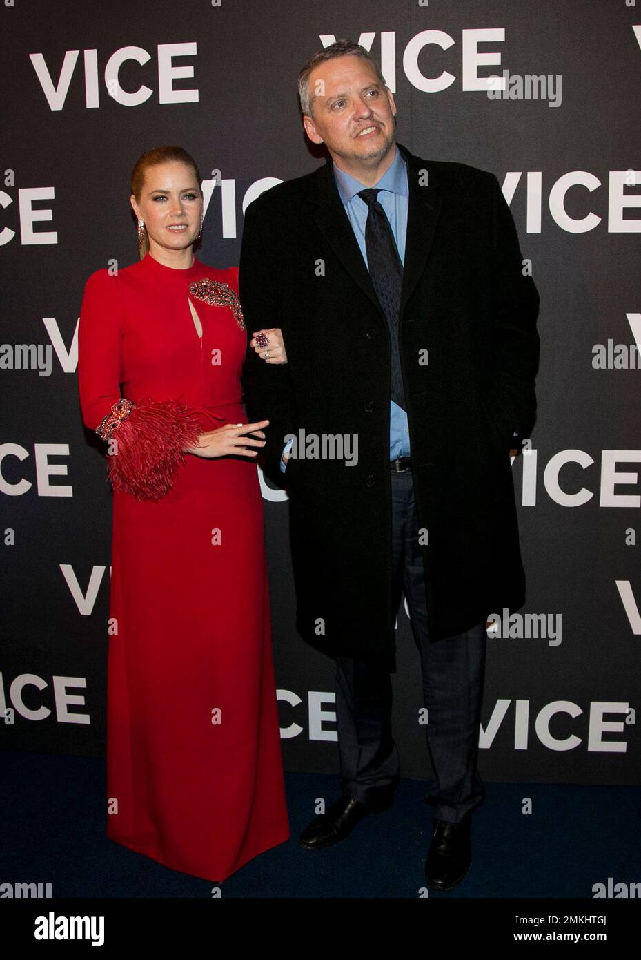 U.S actress Amy Adams, left, and director Adam McKay pose for ...