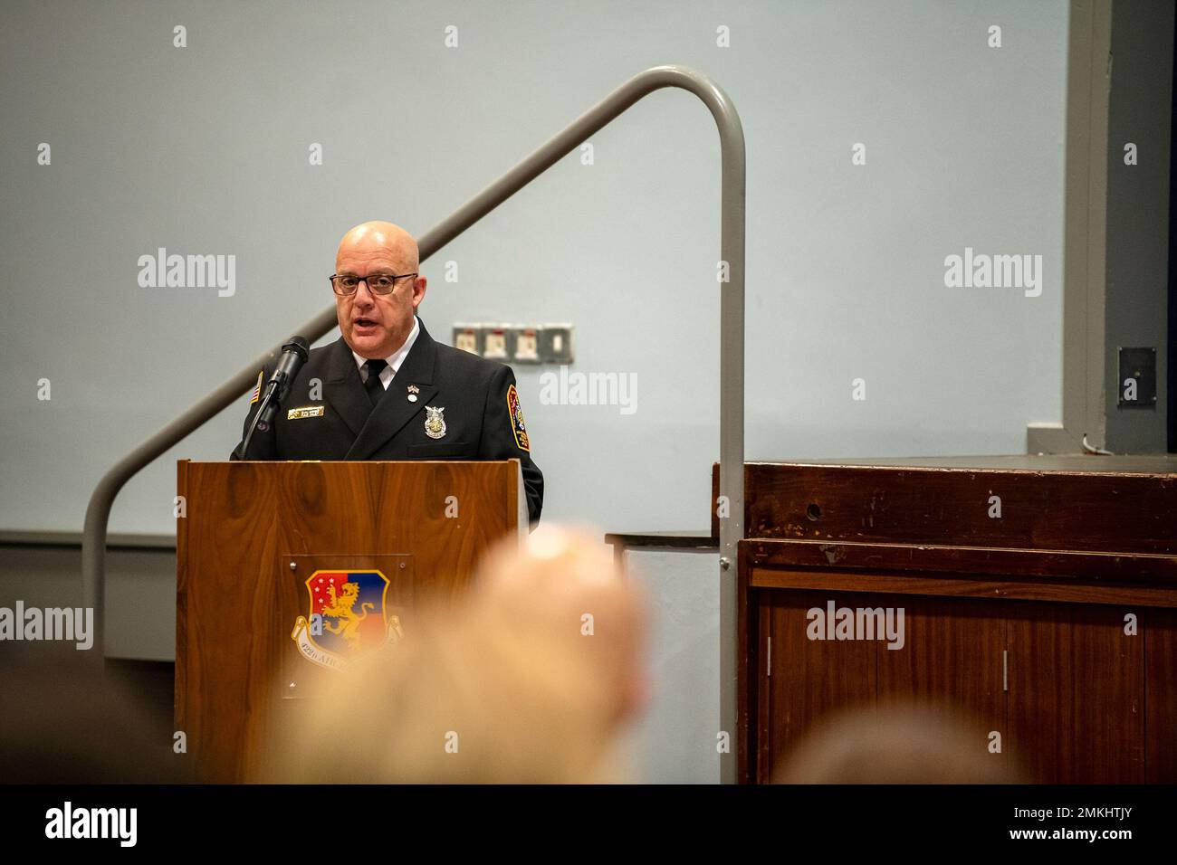 Keith Jimmo, 422d Civil Engineer Squadron fire chief, speaks during a 9 ...