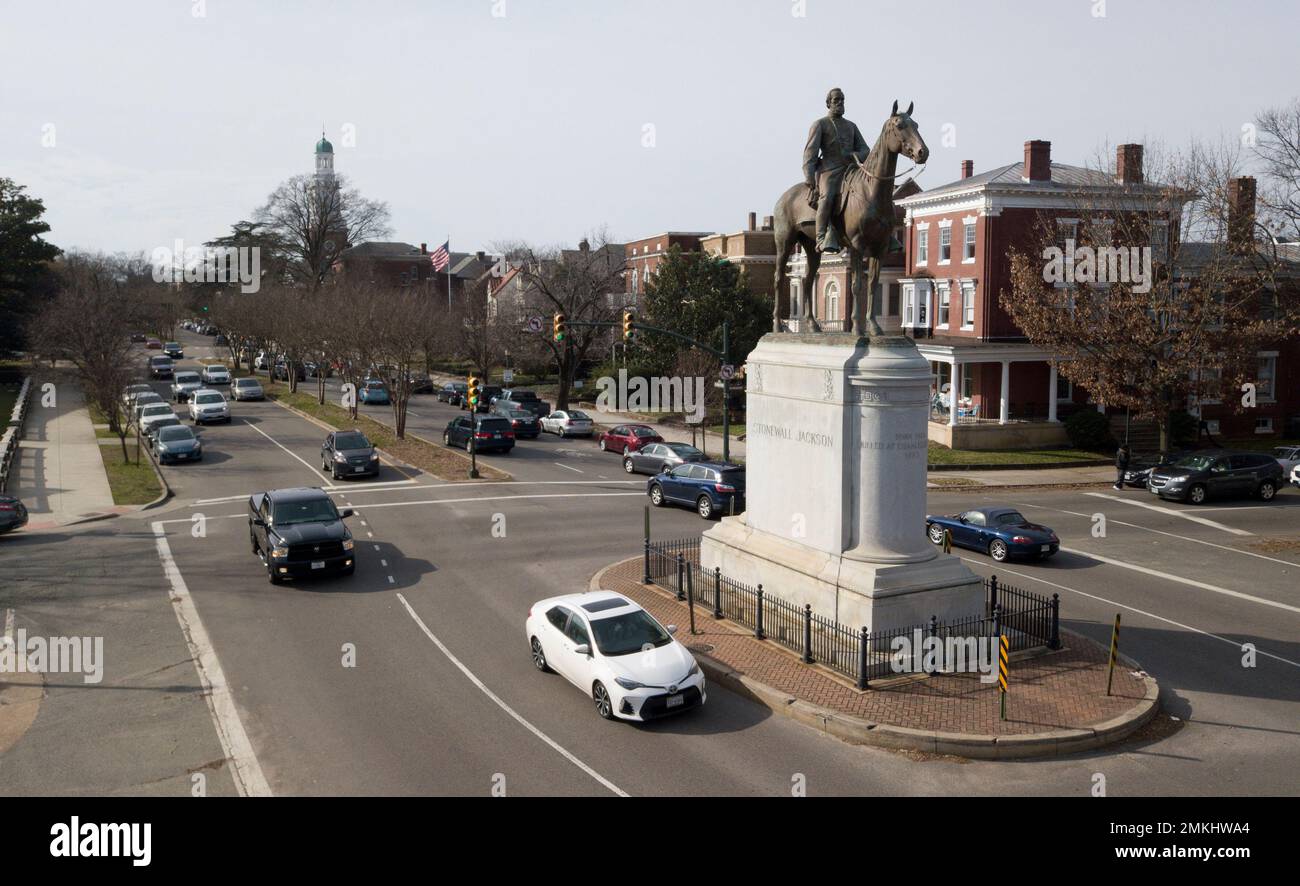 Traffic passes by the statue of Confederate General Stonewall Jackson ...