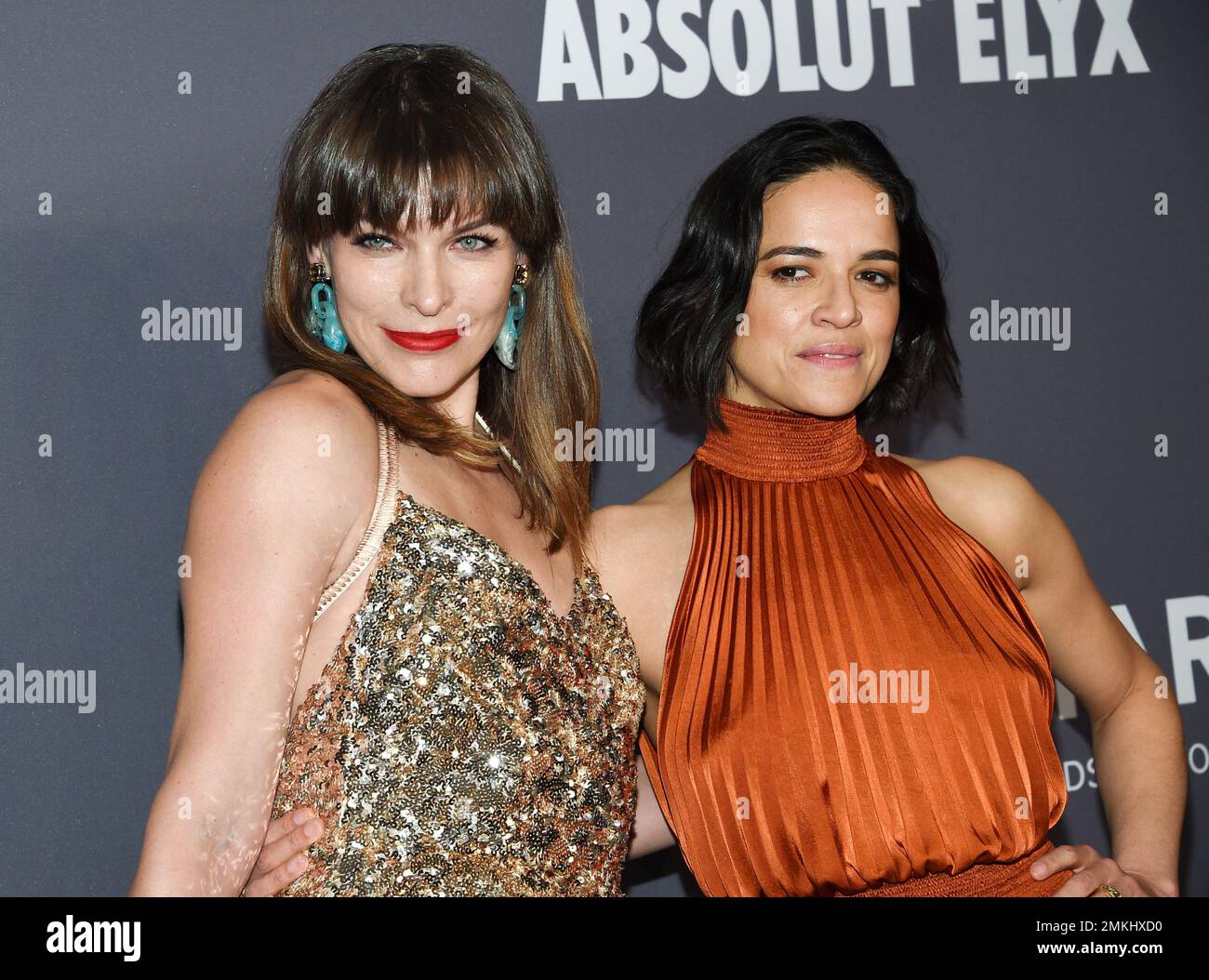 Actors Milla Jovovich, left, and Michelle Rodriguez pose together at ...