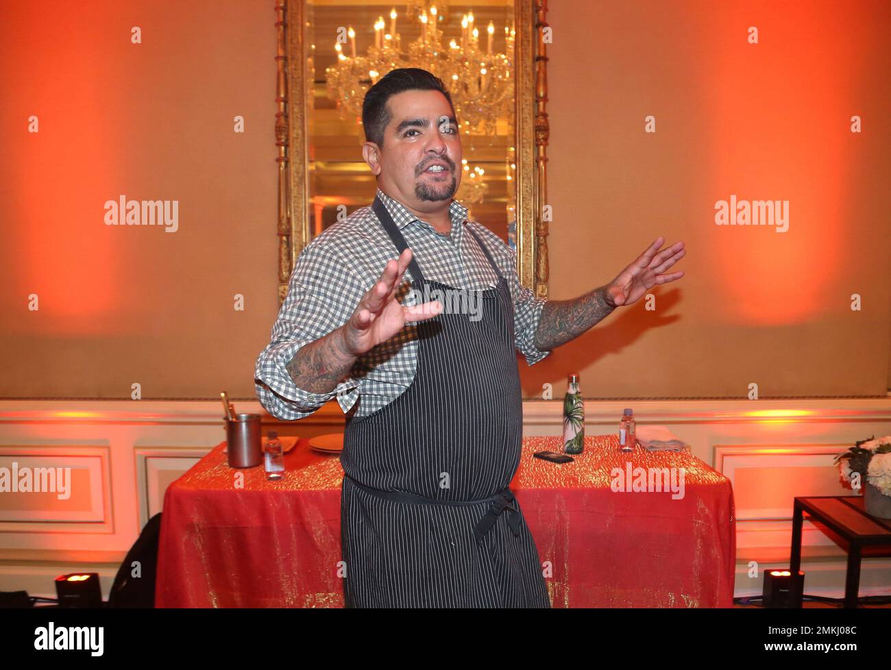 Masterchef Season 10 judge Chef Aaron Sanchez performs a cooking demo ...