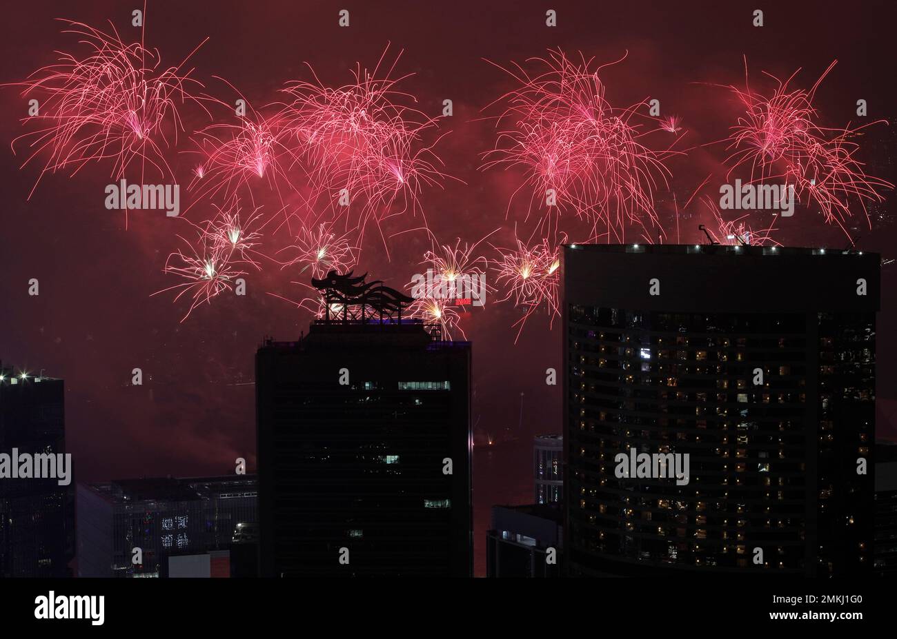Fireworks explode over Victoria Harbour to celebrate the Lunar New Year ...