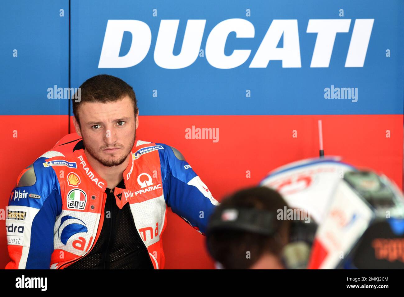 Ducati rider Jack Miller of Australia rests at his team garage during ...