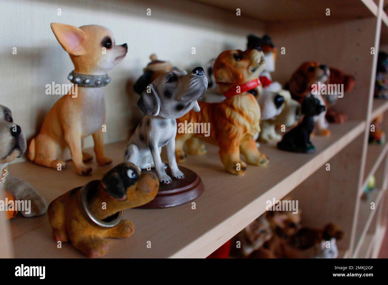 In this Jan. 8, 2019 photo, dog bobbleheads are displayed at the ...